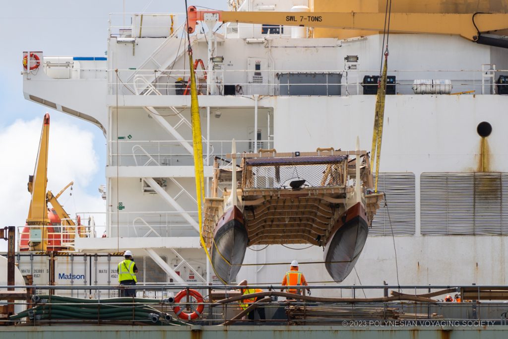 Watch: Voyaging canoe Hōkūle‘a lifted onto Matson ship for transport to ...